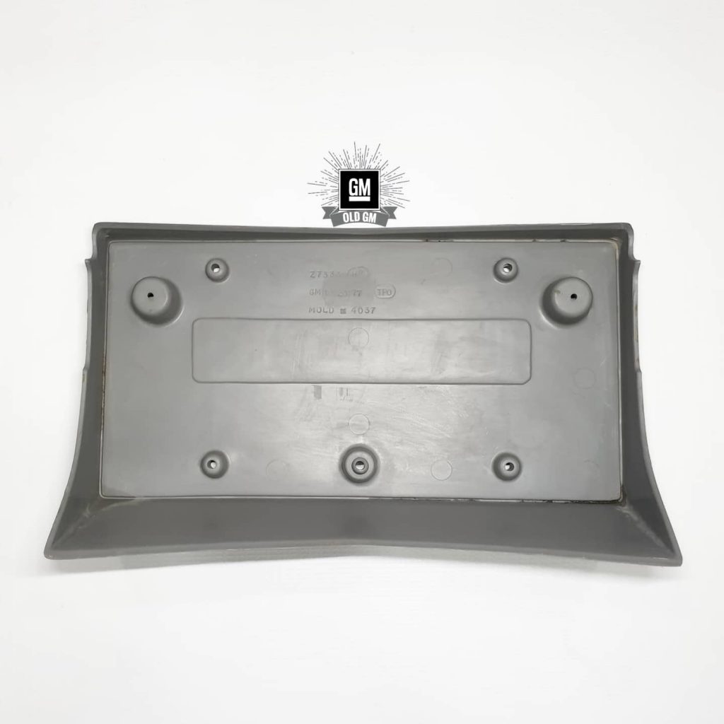 NOS GM 91-96 Buick Roadmaster Front License Plate Bracket - Old GM